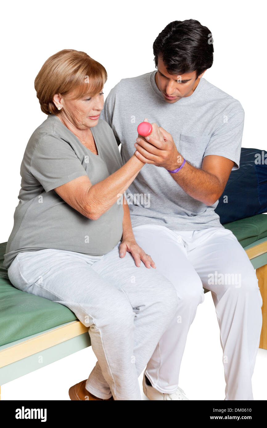 Therapist Giving Muscle Training Over White Background Stock Photo - Alamy