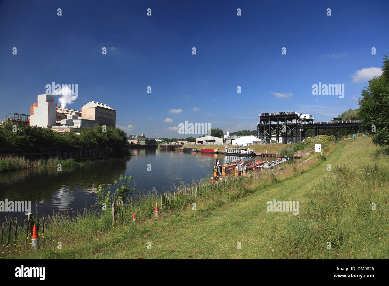 Narrowboats moored on the river Weaver waiting to go up the Anderton ...