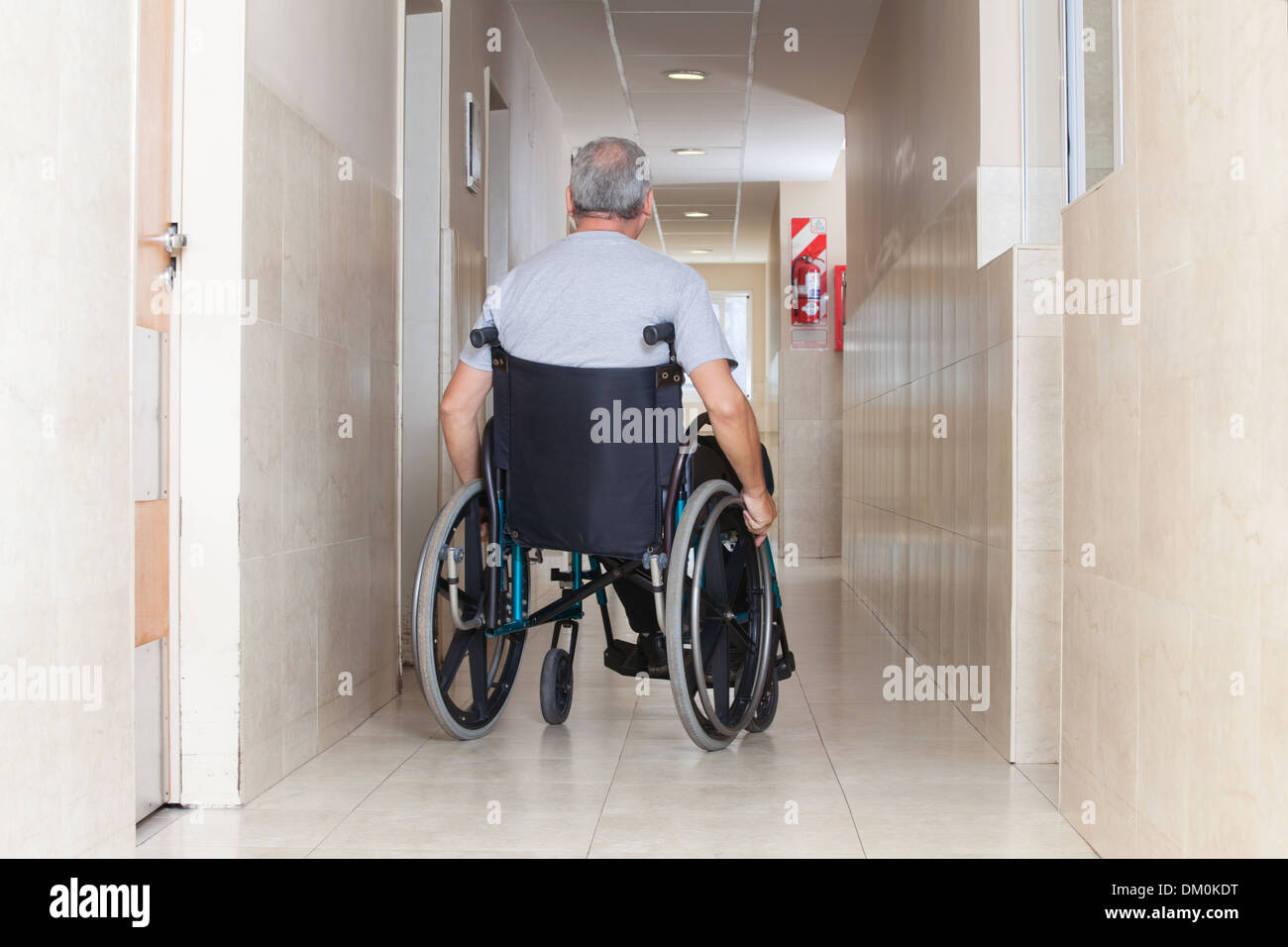 Senior Man Sitting In a Wheelchair Stock Photo - Alamy
