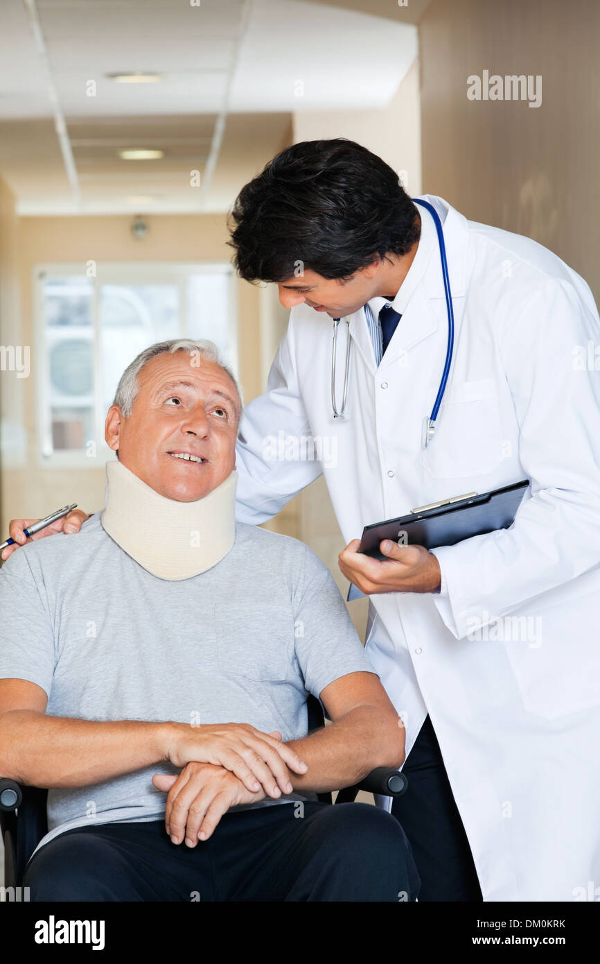 Friendly Doctor With Patient Stock Photo - Alamy