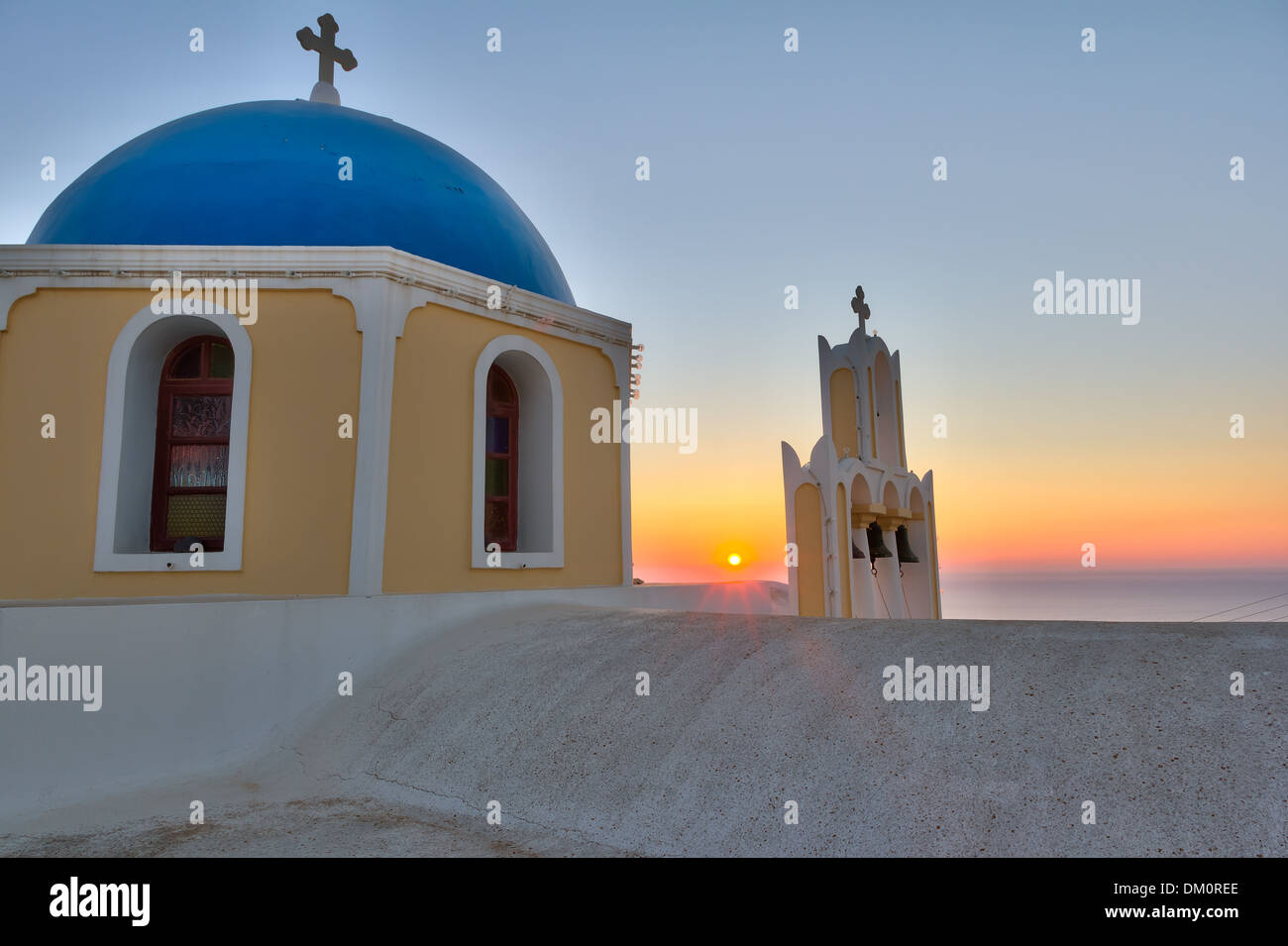 Traditional white church at Fira, Santorini in Greece in high dynamic ...