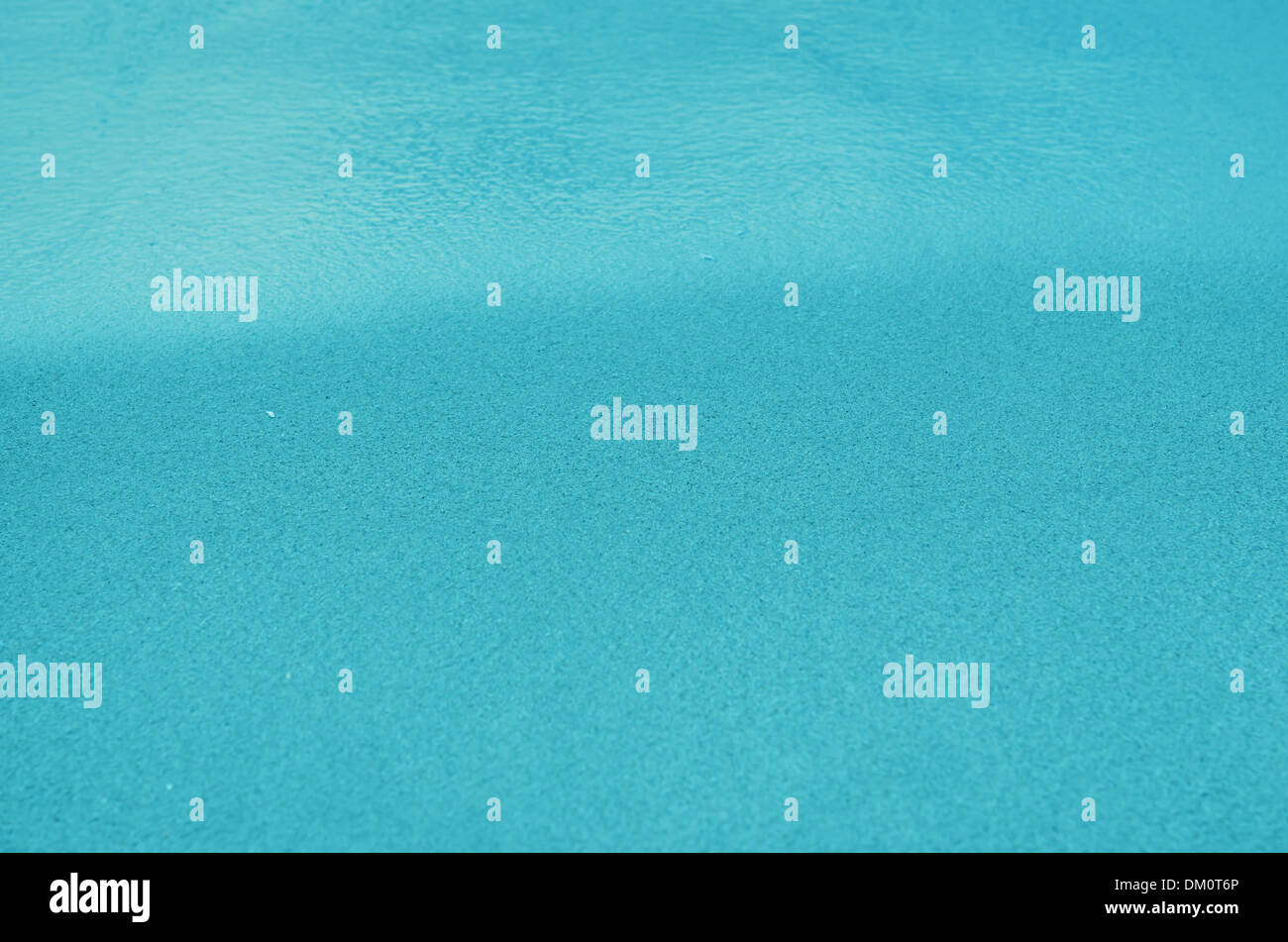 Blue Sandy beach background. Detailed sand texture and water . Top view ...
