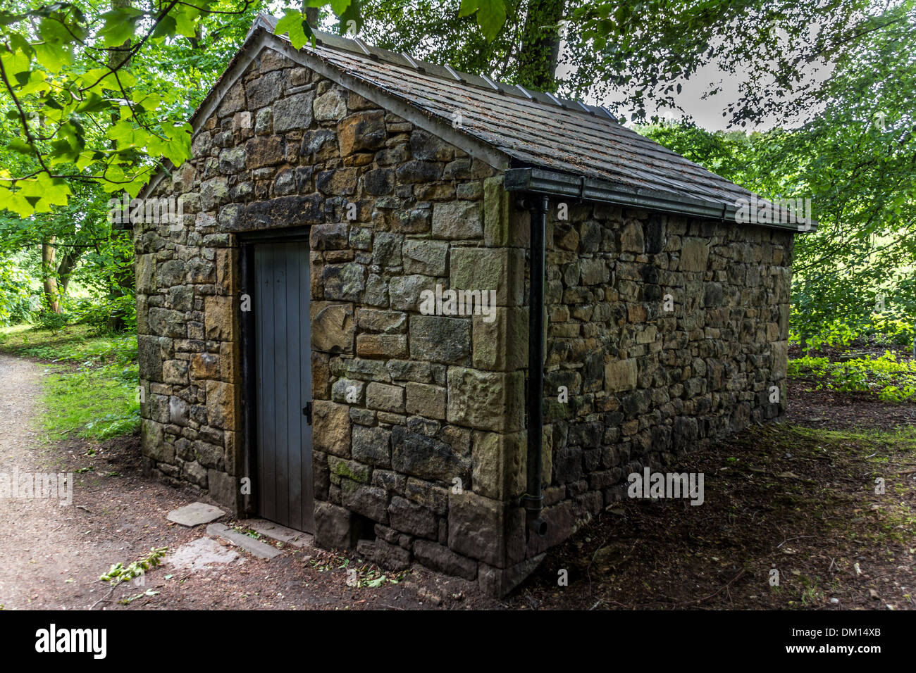 Old stone build barn in a woodland area Stock Photo - Alamy