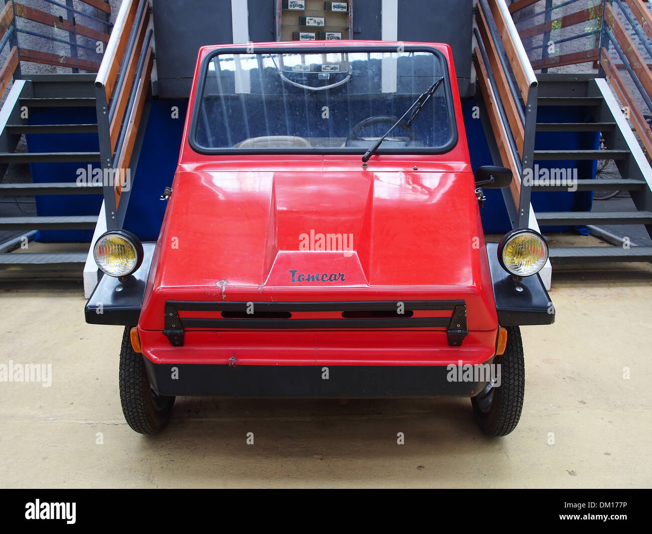 The red Tomcar is a compact, rugged off-road vehicle designed for tough ...