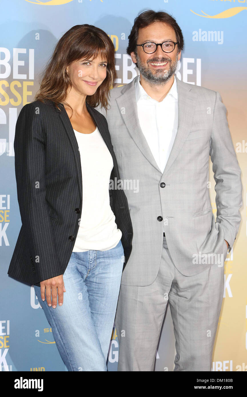 Sophie Marceau and director James Huth attend a photocall 'Happiness ...