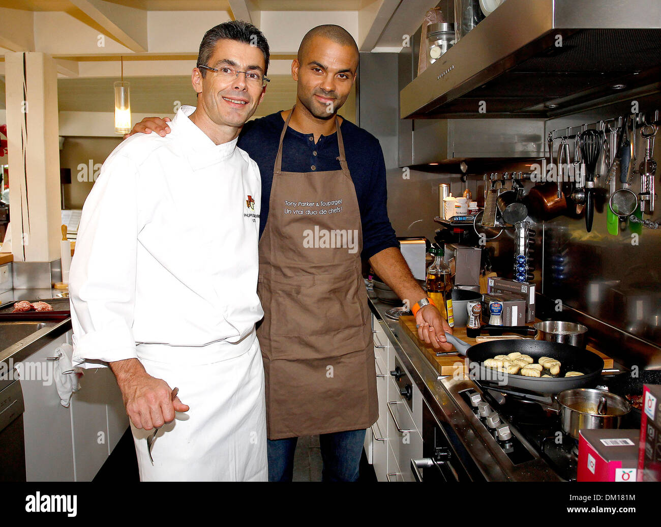 Tony Parker with head chef Philippe Gauvreau cooking frozen food brand ...