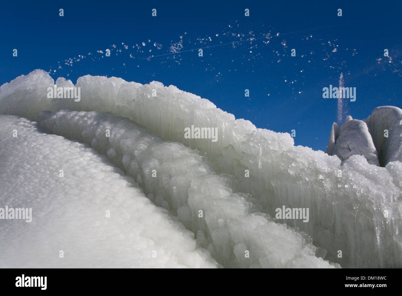 Ice formation made by Water fountain Drop Winter White Blue Stock Photo ...