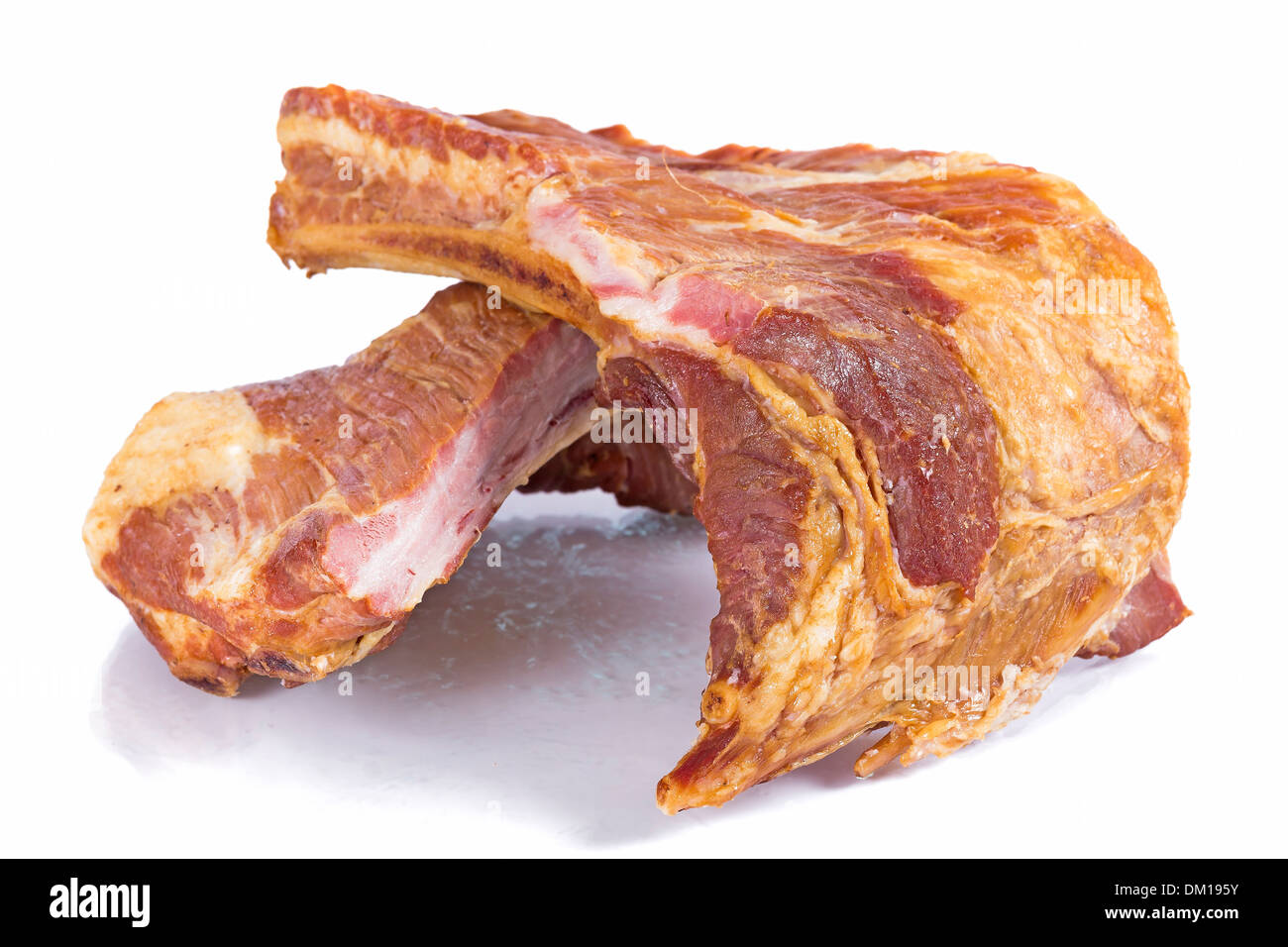 smoked ribs on a white background Stock Photo - Alamy