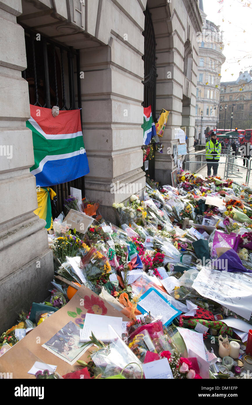 London, UK 10th December 2013. Tributes are paid to Nelson Mandela at ...