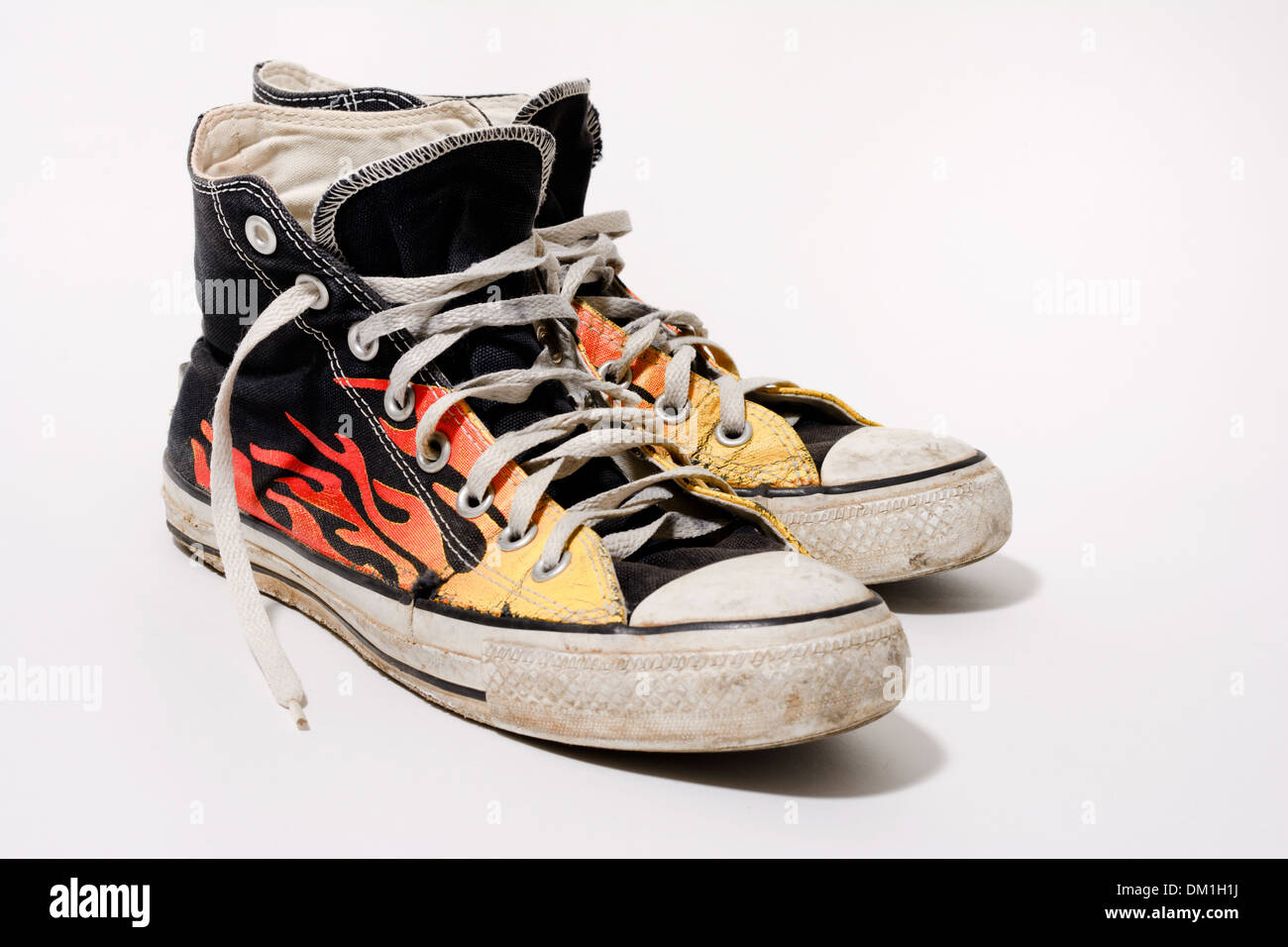 Worn and dirty Converse All Star shoes isolated on white background ...