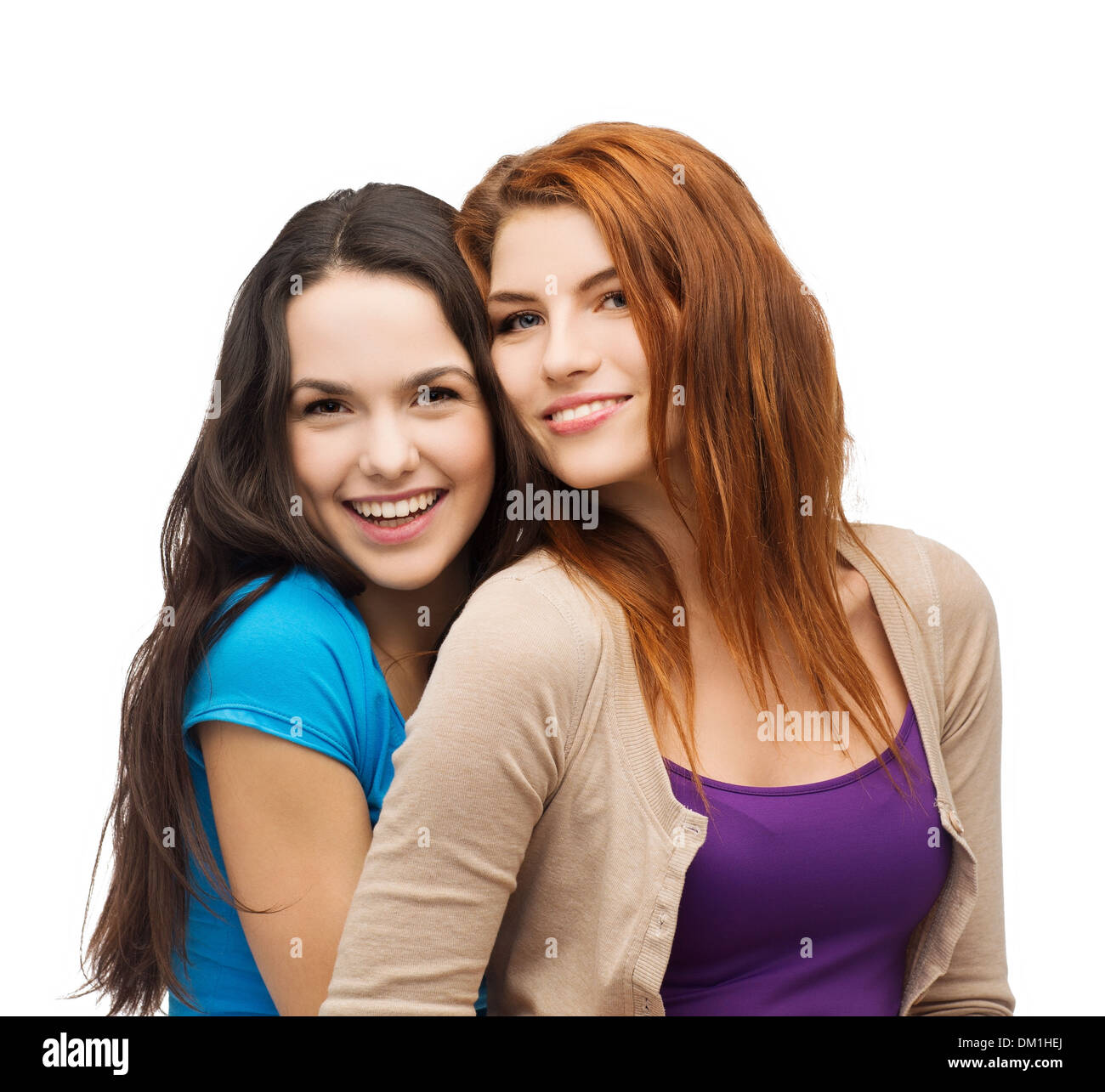 two smiling girls hugging Stock Photo - Alamy