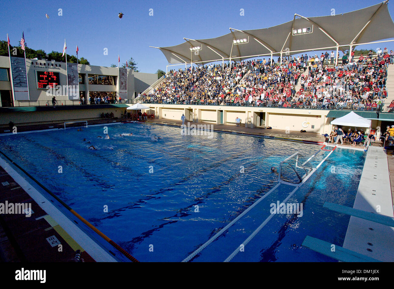 Fans look on during a water polo match at the Avery Aquatic Center in ...