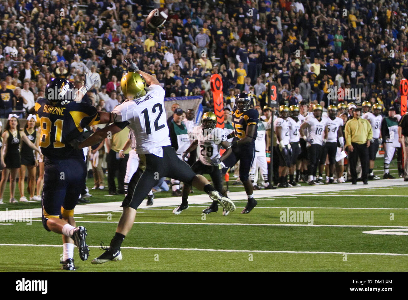 Toledo tight end Tom Burzine (81) and Colorado safety Patrick Mahnke ...