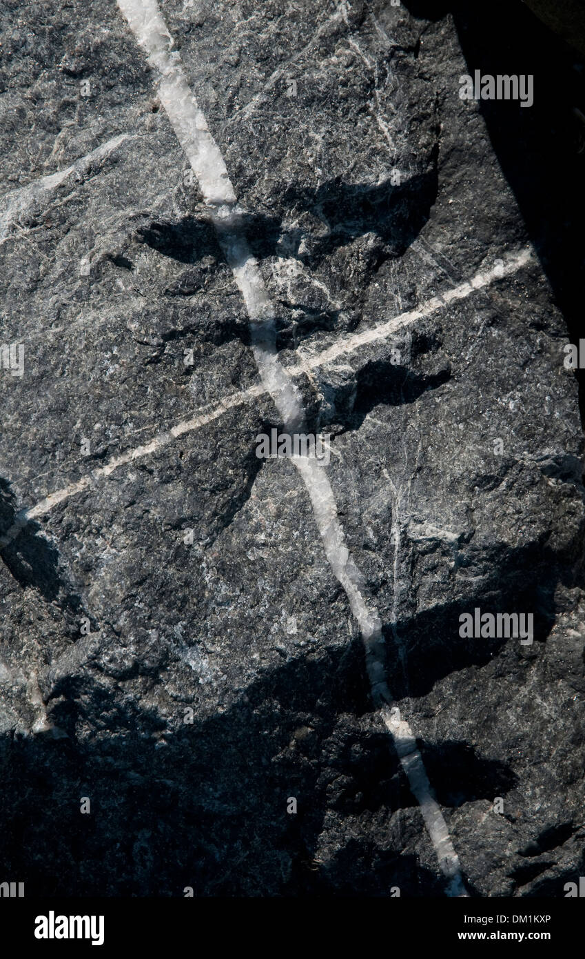 natural cross on granite rock, normandy, france Stock Photo - Alamy