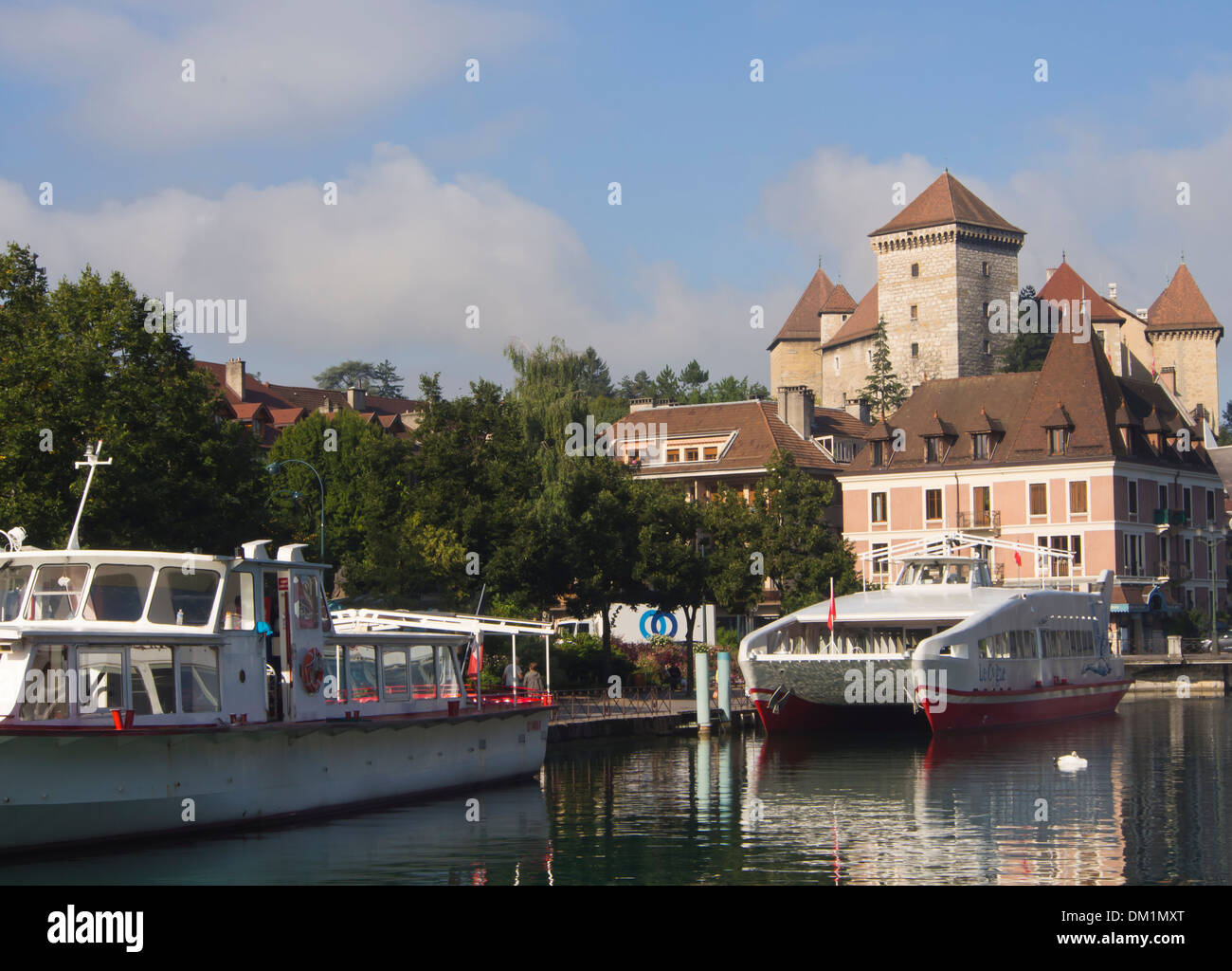 Sightseeing boats ready for departure at the quay in Annecy France for ...