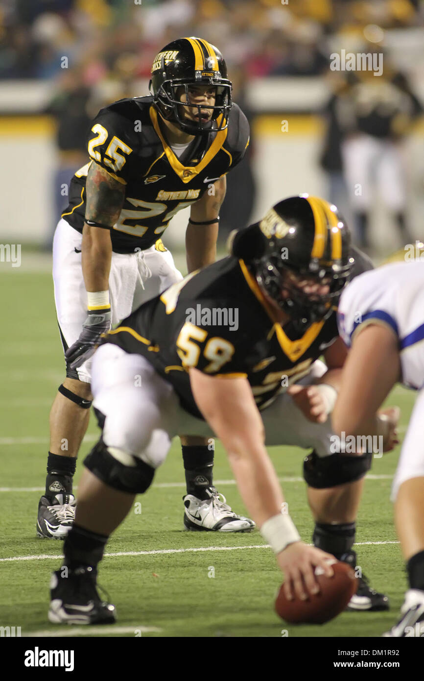 Southern Miss running back Damion Fletcher (25) reads the defense ...