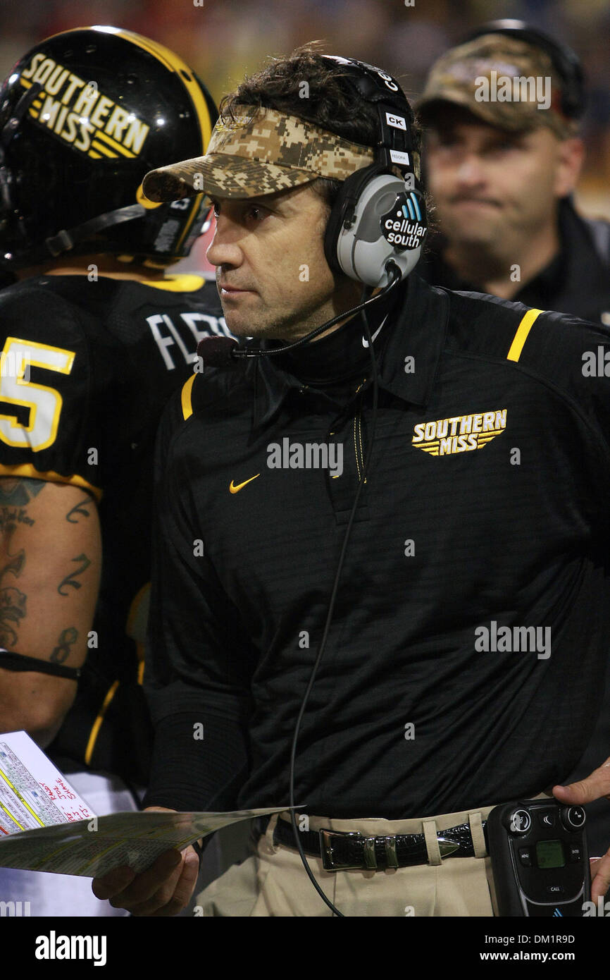 Southern Miss head coach Larry Fedora talks with his team during the ...