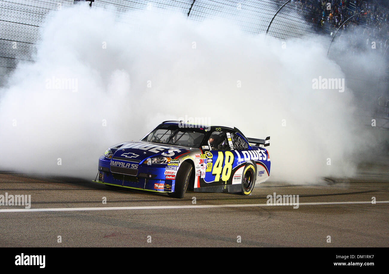 Sprint Cup driver Jimmie Johnson #48 celebrates his series championship ...