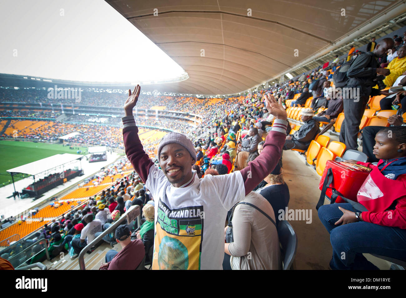 Johannesburg, South Africa. 10th December 2013. Thousands of people ...