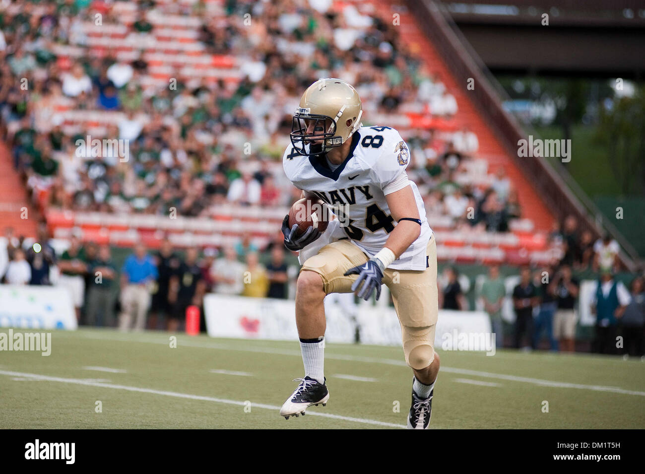 Navy wide receiver Greg Jones #84 catches a pass during 1st half action ...