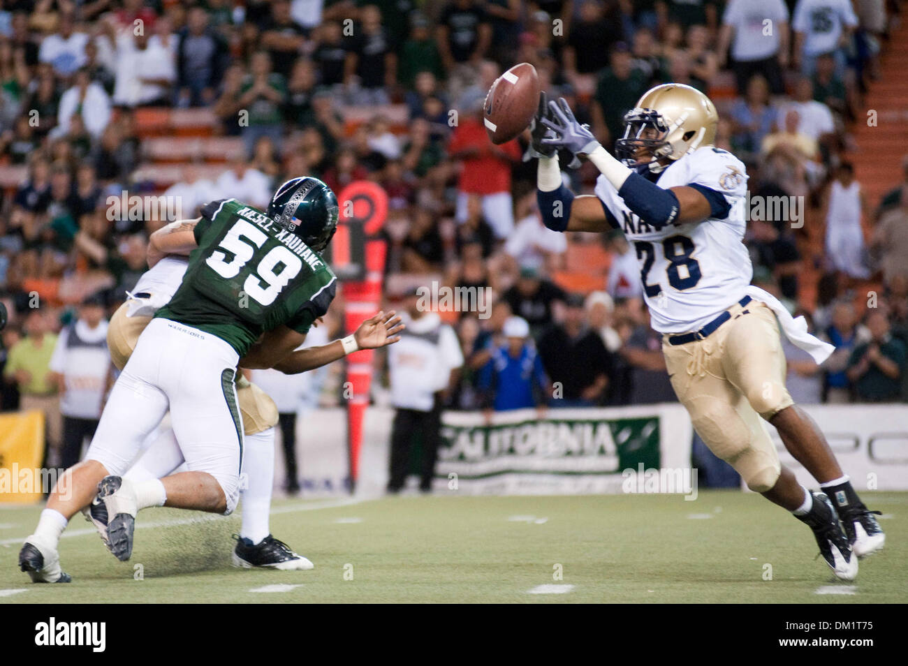 Navy running back Marcus Curry #28 takes a pitch during game action in ...