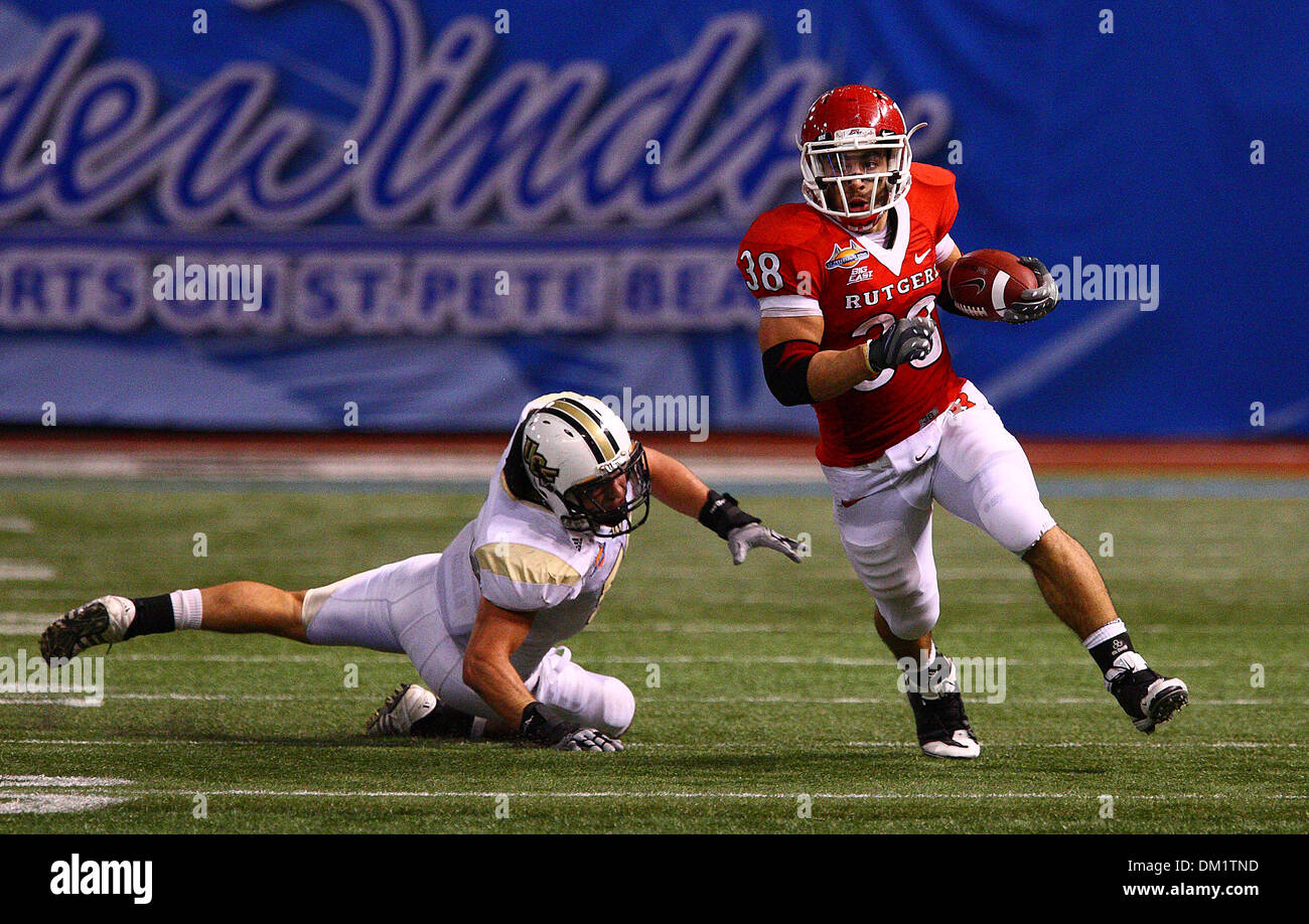 Rutgers running back Joe Martinek #38 avoids a tackle during the second ...