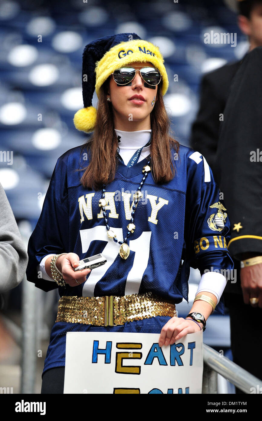 A Navy fan in the stands during the NCAA football game between the ...