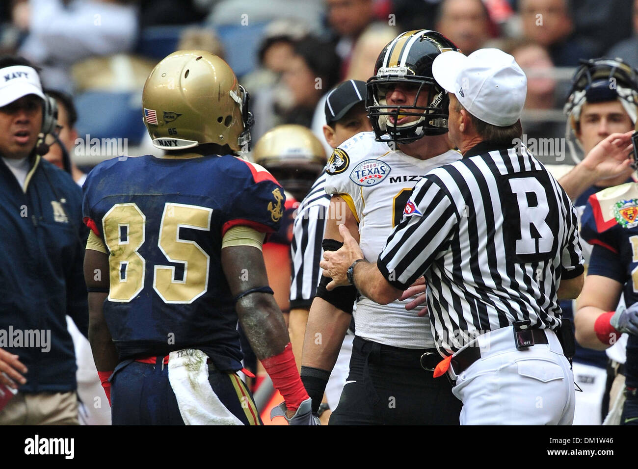 Navy wide receiver Mario Washington #85 gets into a discussion with a ...