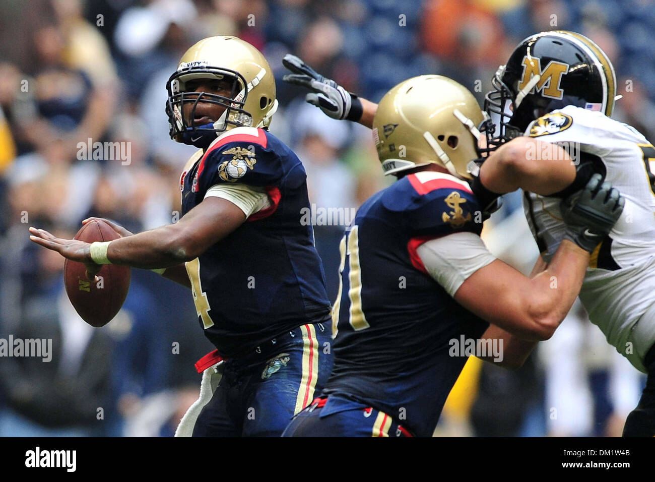 Navy quarterback Ricky Dobbs #4 during the NCAA football game between ...