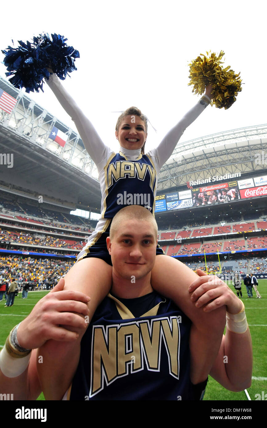 Navy cheerleaders during the NCAA football game between the Naval ...