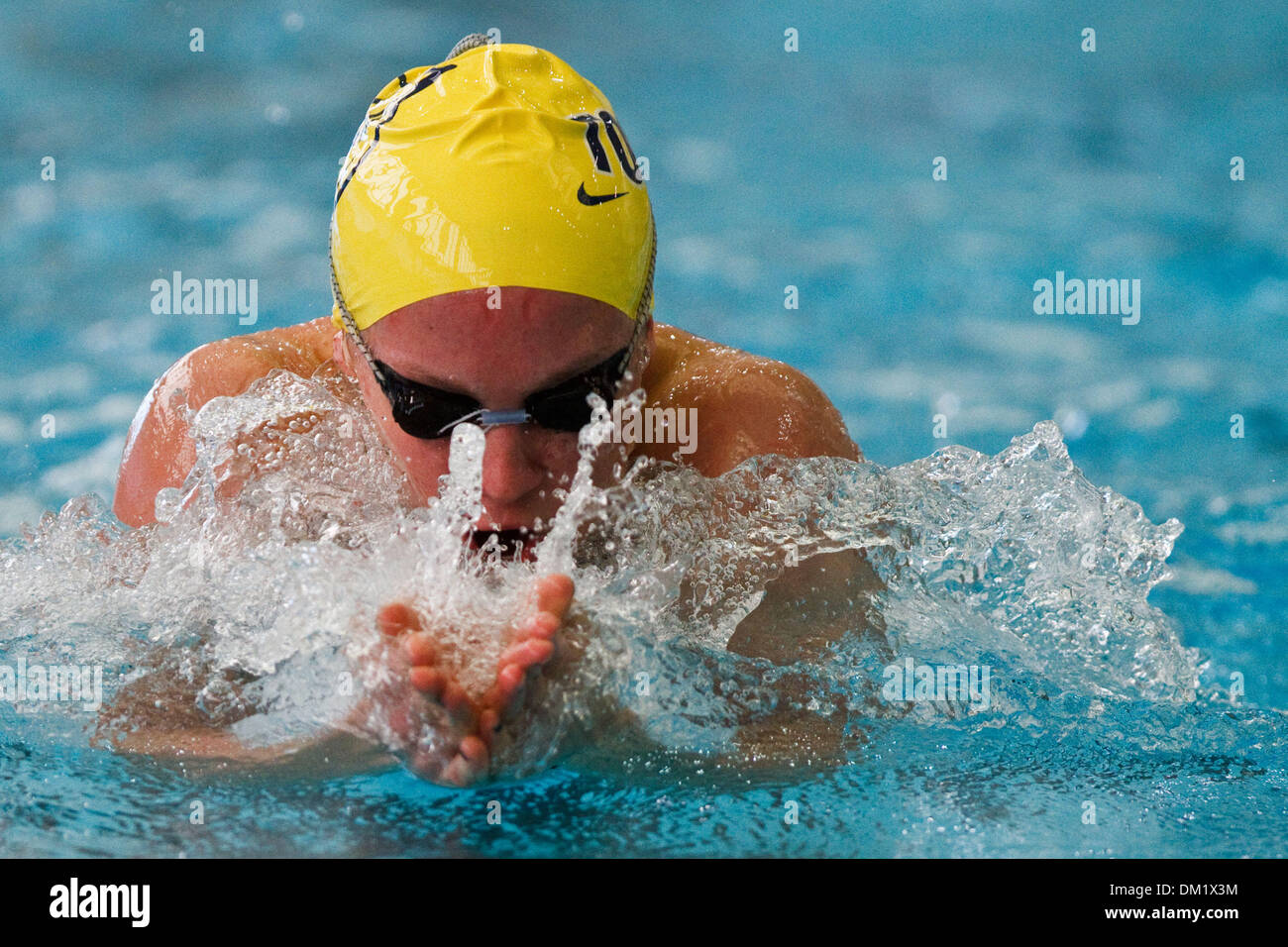 A Toledo swimmer competes in the 100-yard breaststroke event during ...