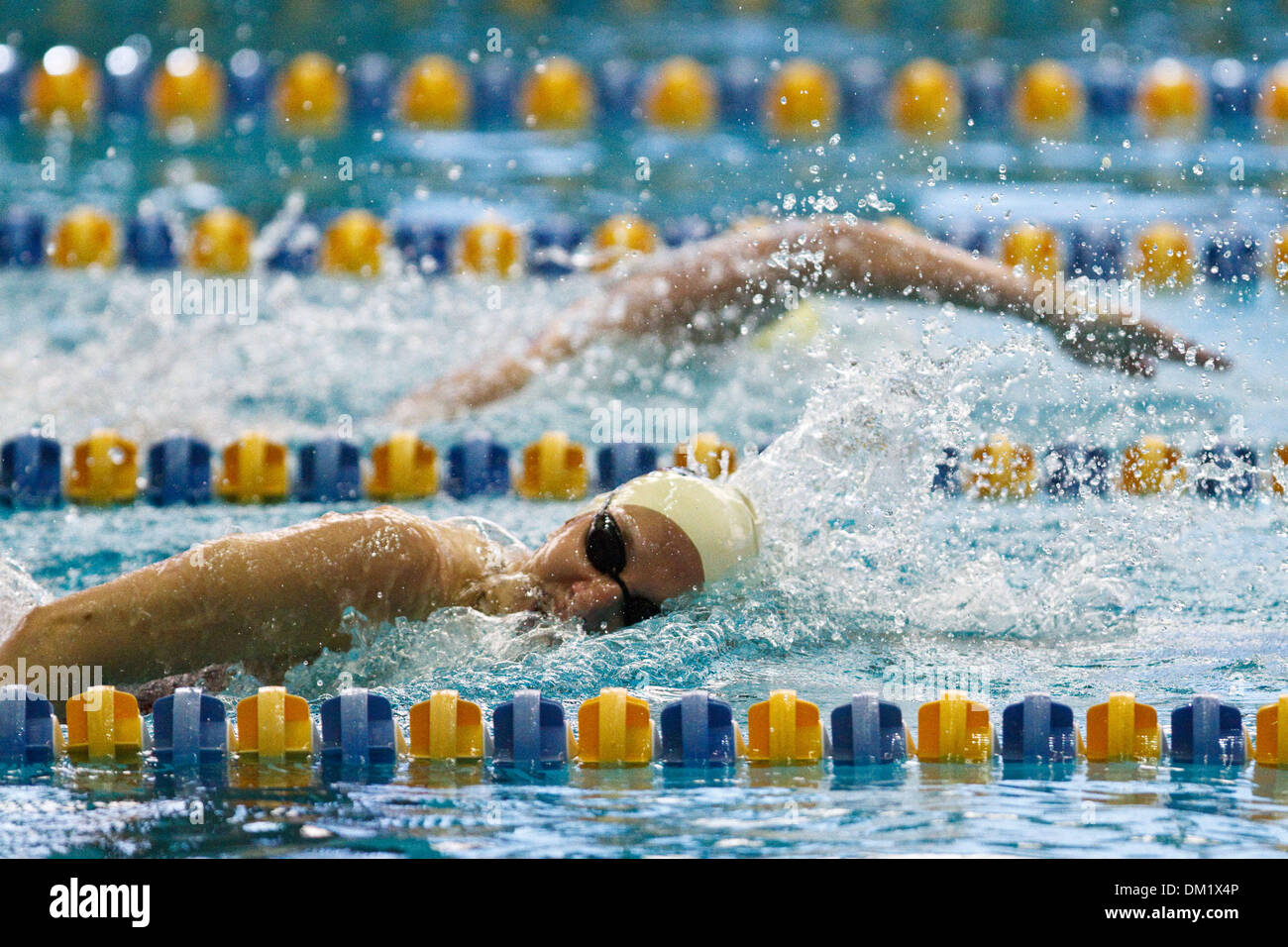 An Ohio State swimmer competes in the 400-yard free style relay event ...