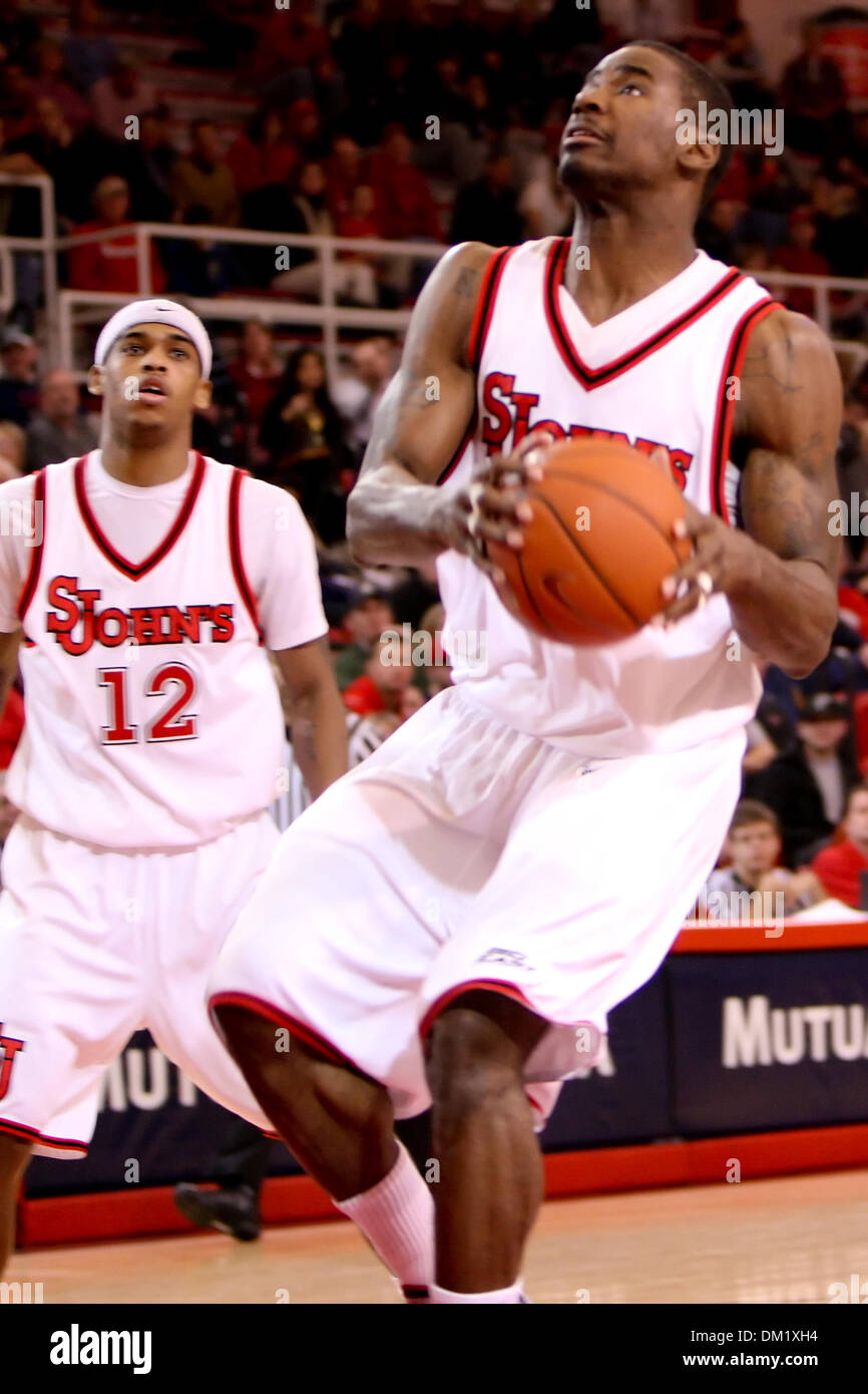 St Johns #24 Justin Burrell goes for the shot. St. Johns defeated ...