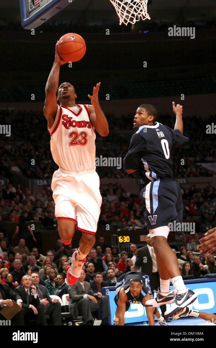 St Johns #23 Paris Horne for the point with Villanova #0 Antonio Pena ...