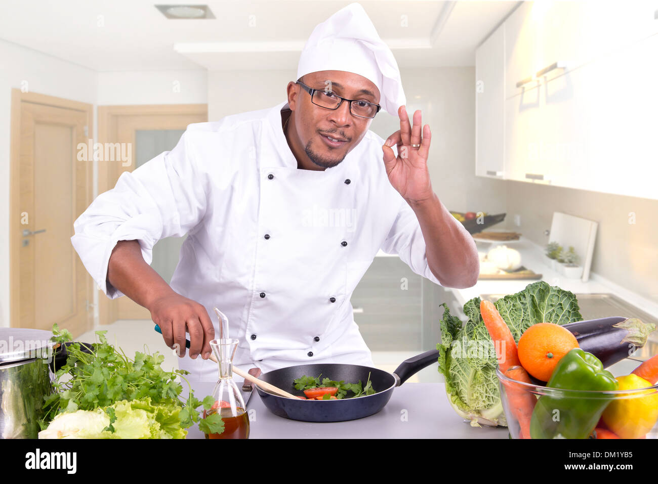 Male chef with fruits and vegetables cooking Stock Photo - Alamy