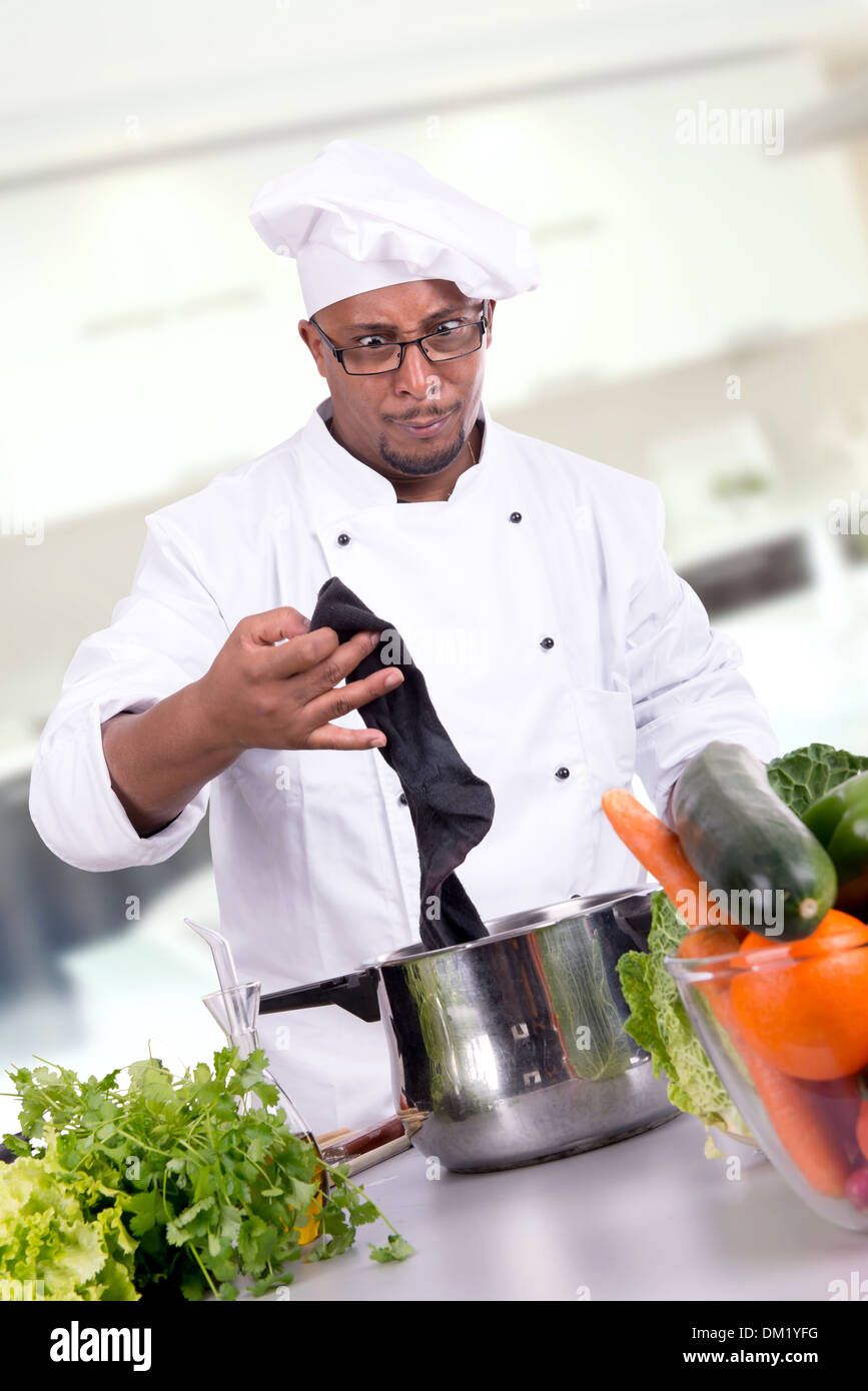 Removing pan from cooker hi-res stock photography and images - Alamy