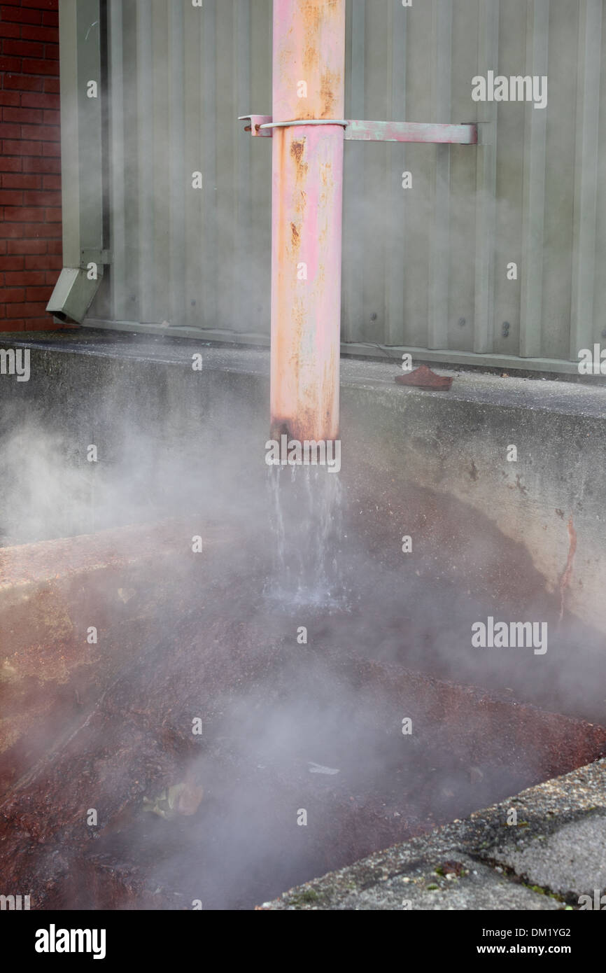 A storage tank overflowing Stock Photo - Alamy