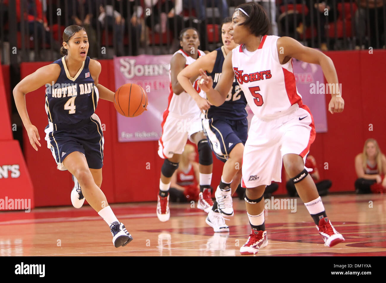 Notre Dame guard Skylar Diggins #4 drives upcourt while St. John's ...