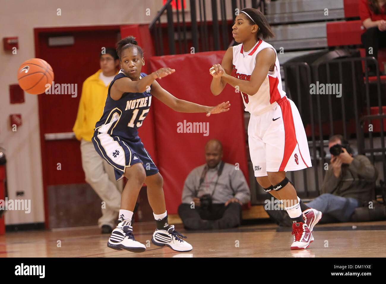 St. John's guard Nadirah McKenith #5 passes while Notre Dame guard ...