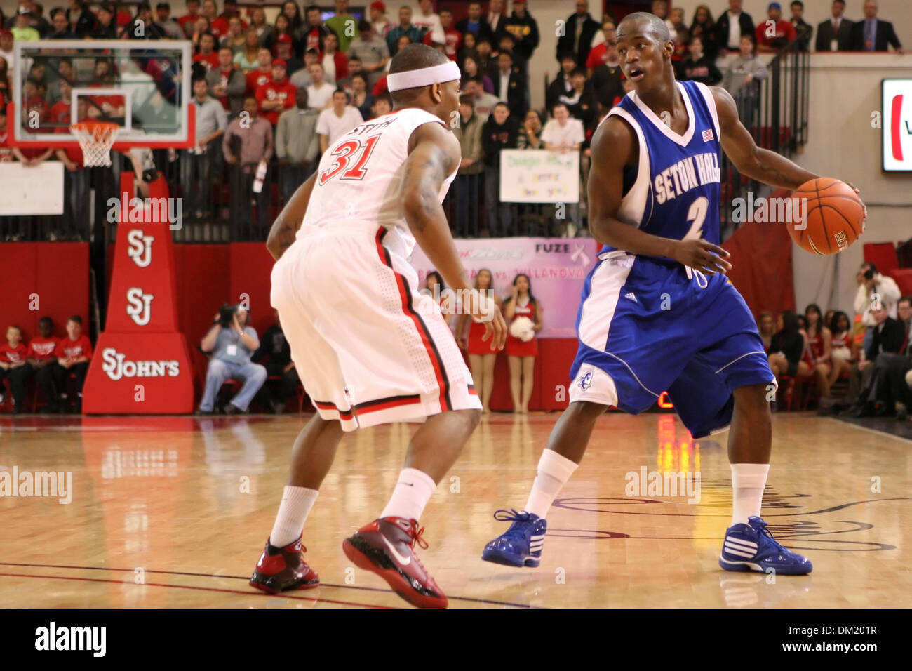 Seton Hall guard Keon Lawrence #2 and St. John's guard Malik Stith #31 ...