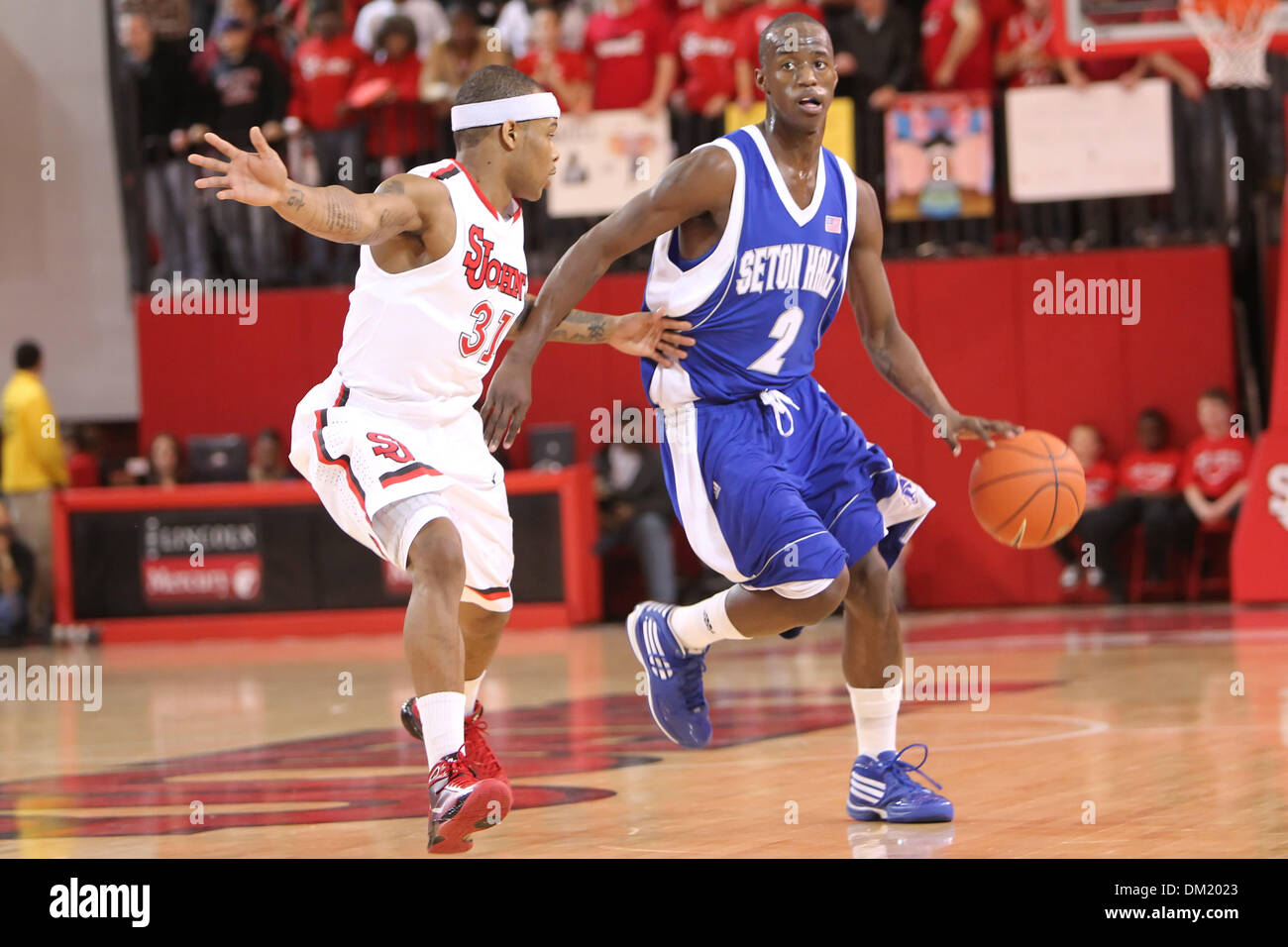 Seton Hall guard Keon Lawrence #2 and St. John's guard Malik Stith #31 ...