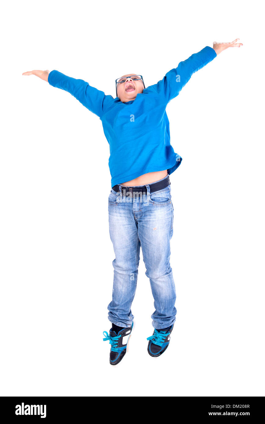 Young boy jumping isolated in white Stock Photo - Alamy