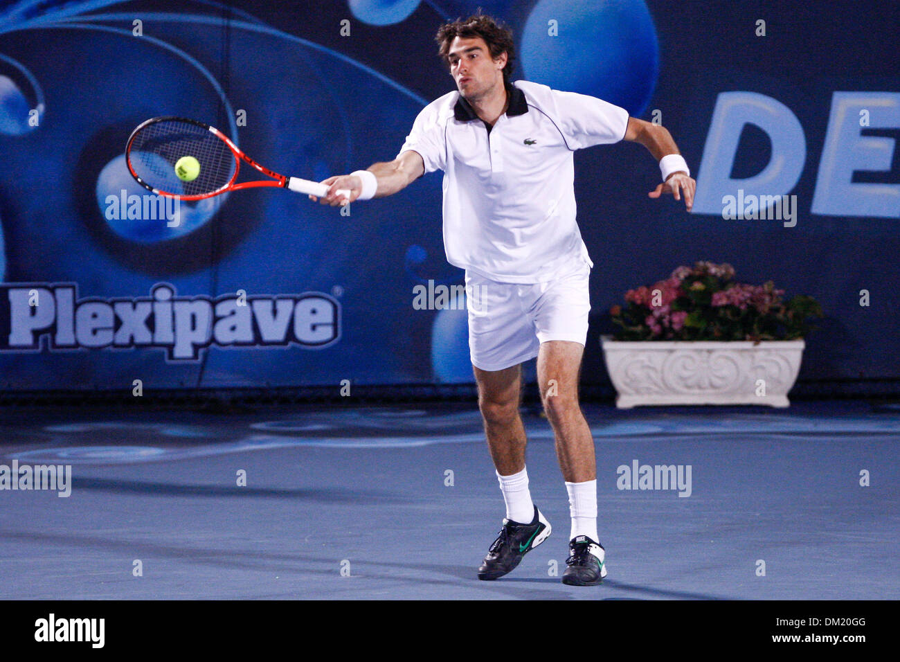 ATP Singles World Tour player Jeremy Chardy of France returns the ball ...