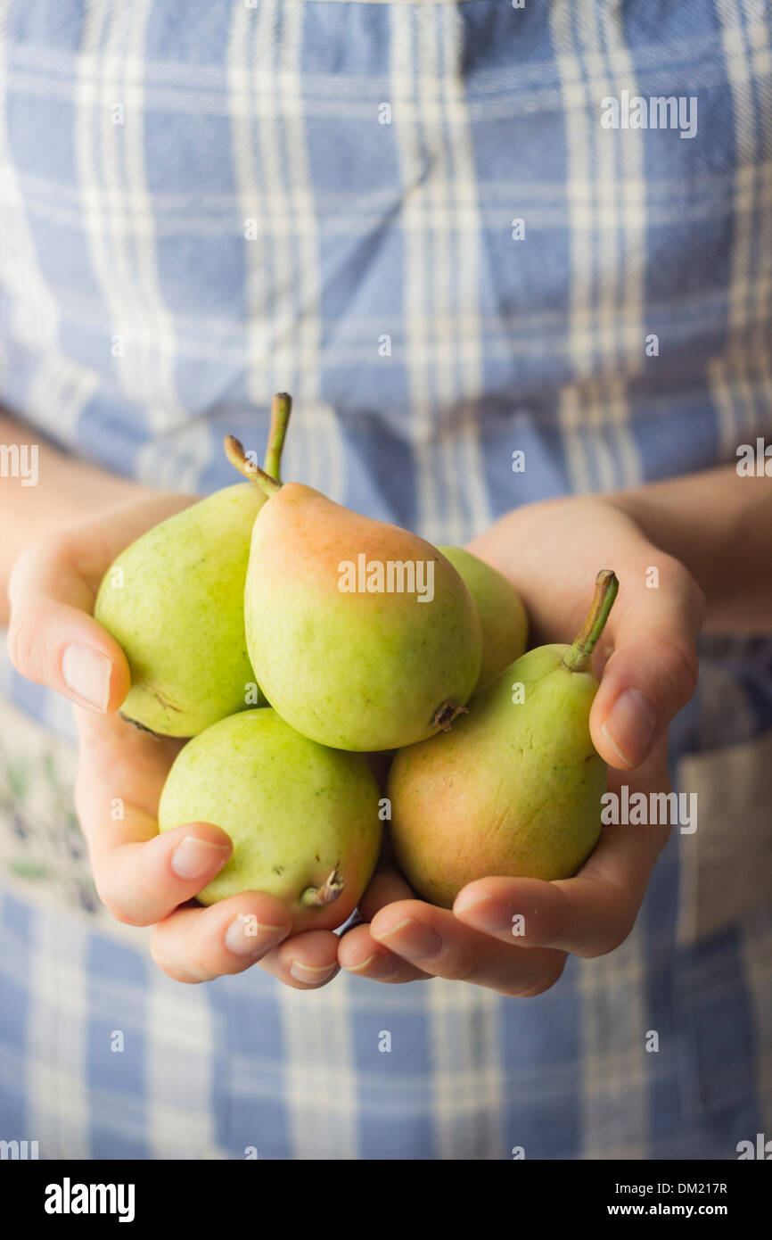 Hand holding pears on green hi-res stock photography and images - Alamy