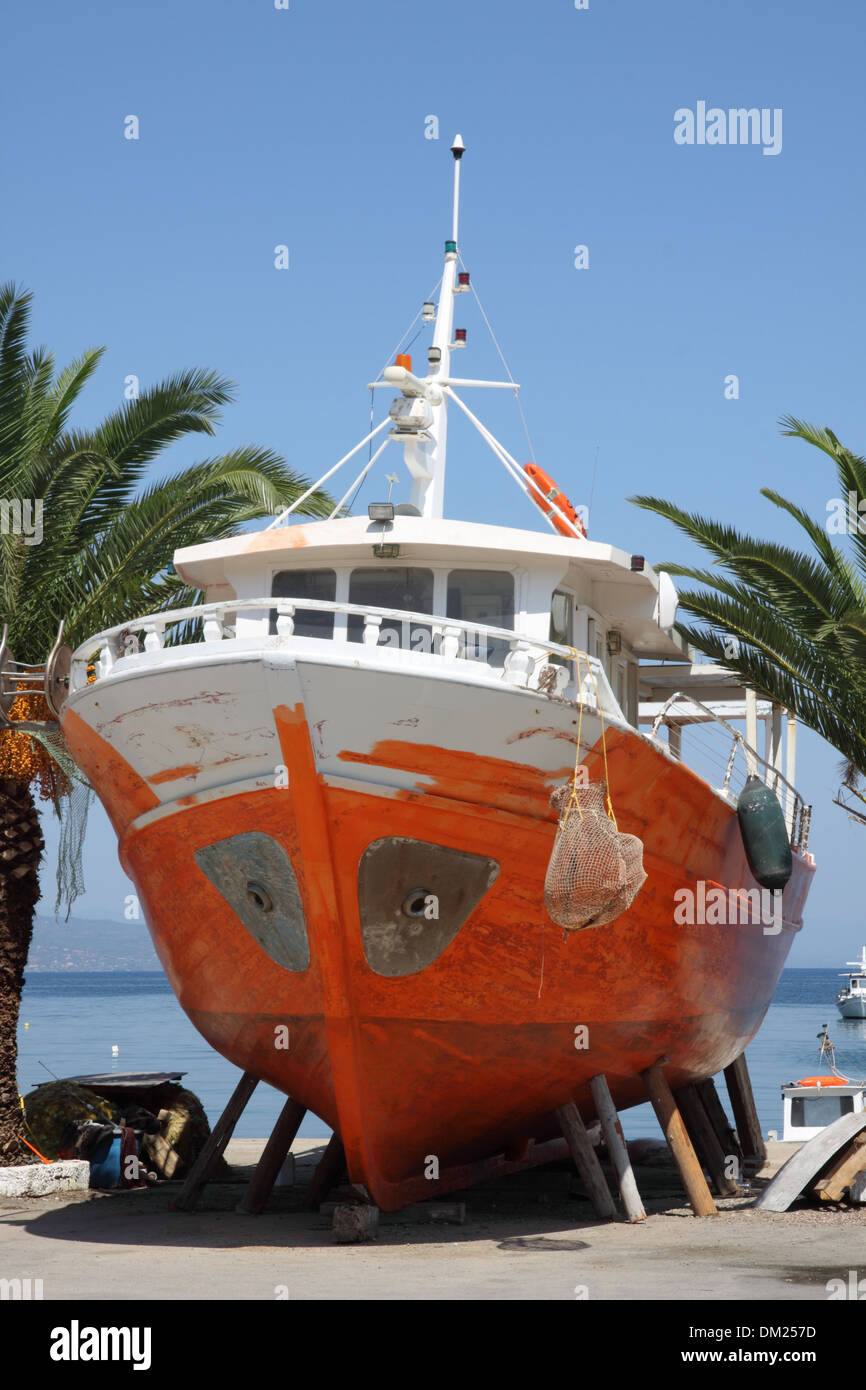Peloponnesos fishing boat bright orange boat hi-res stock photography ...