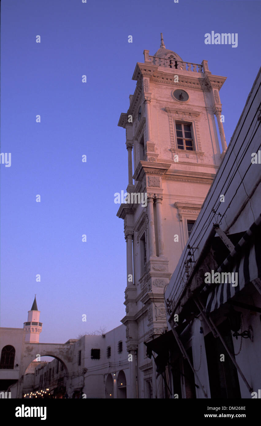 Ottoman Clock tower in Tripoli's old town medina at sunset Stock Photo ...