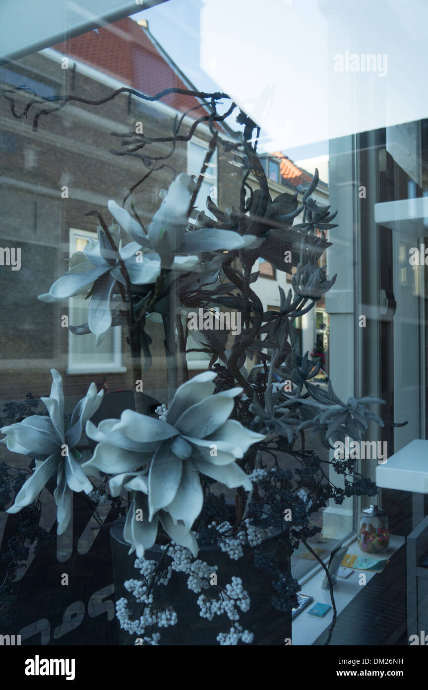 Beautifully decorated window with artificial flowers as seen from the ...