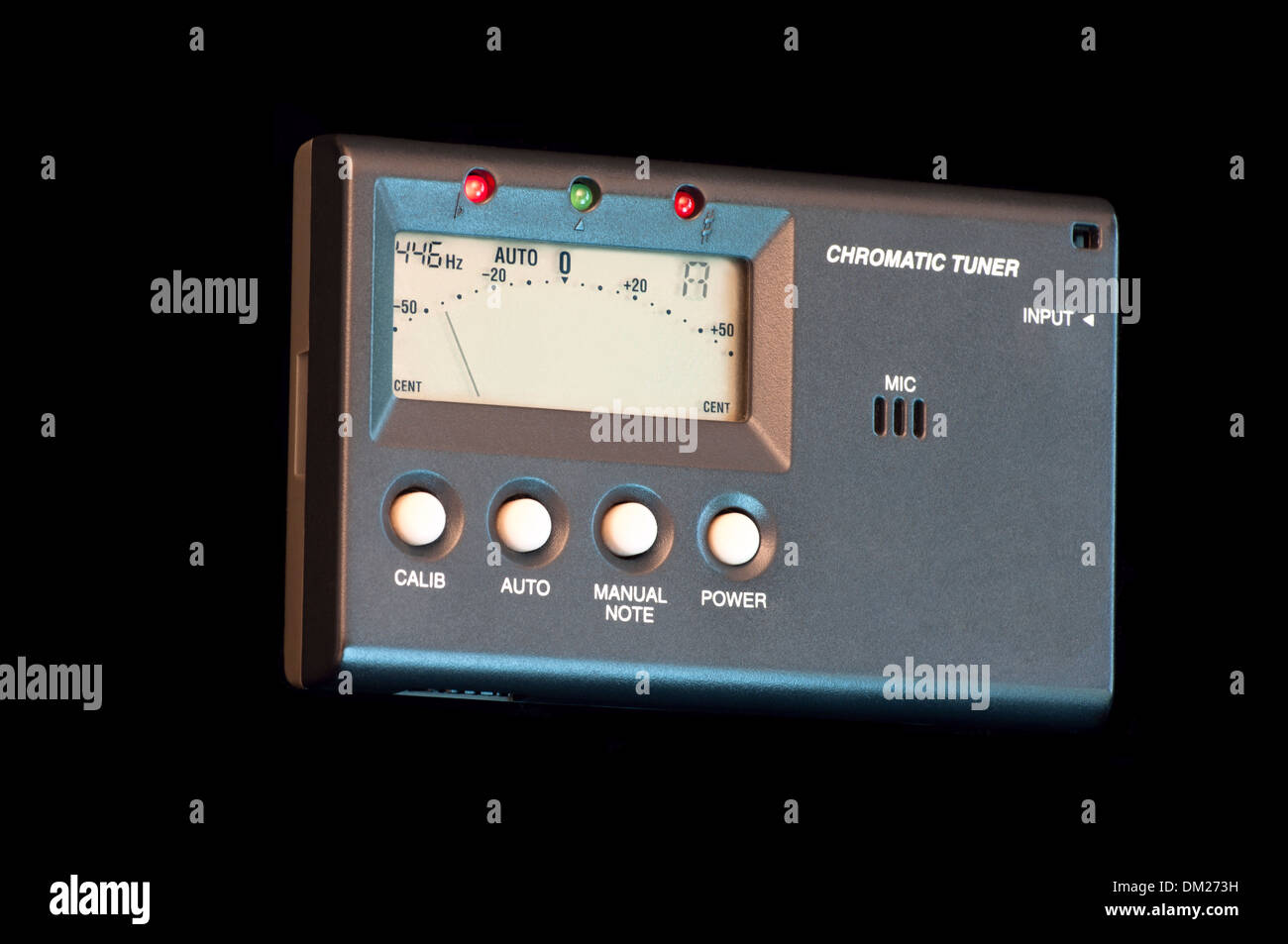 Small digital chromatic tuning instrument isolated against black Stock ...