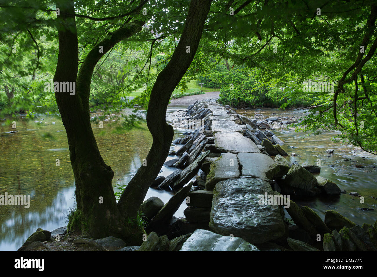 Tarr Steps, a medieval clapper bridge across the River Barle in the ...