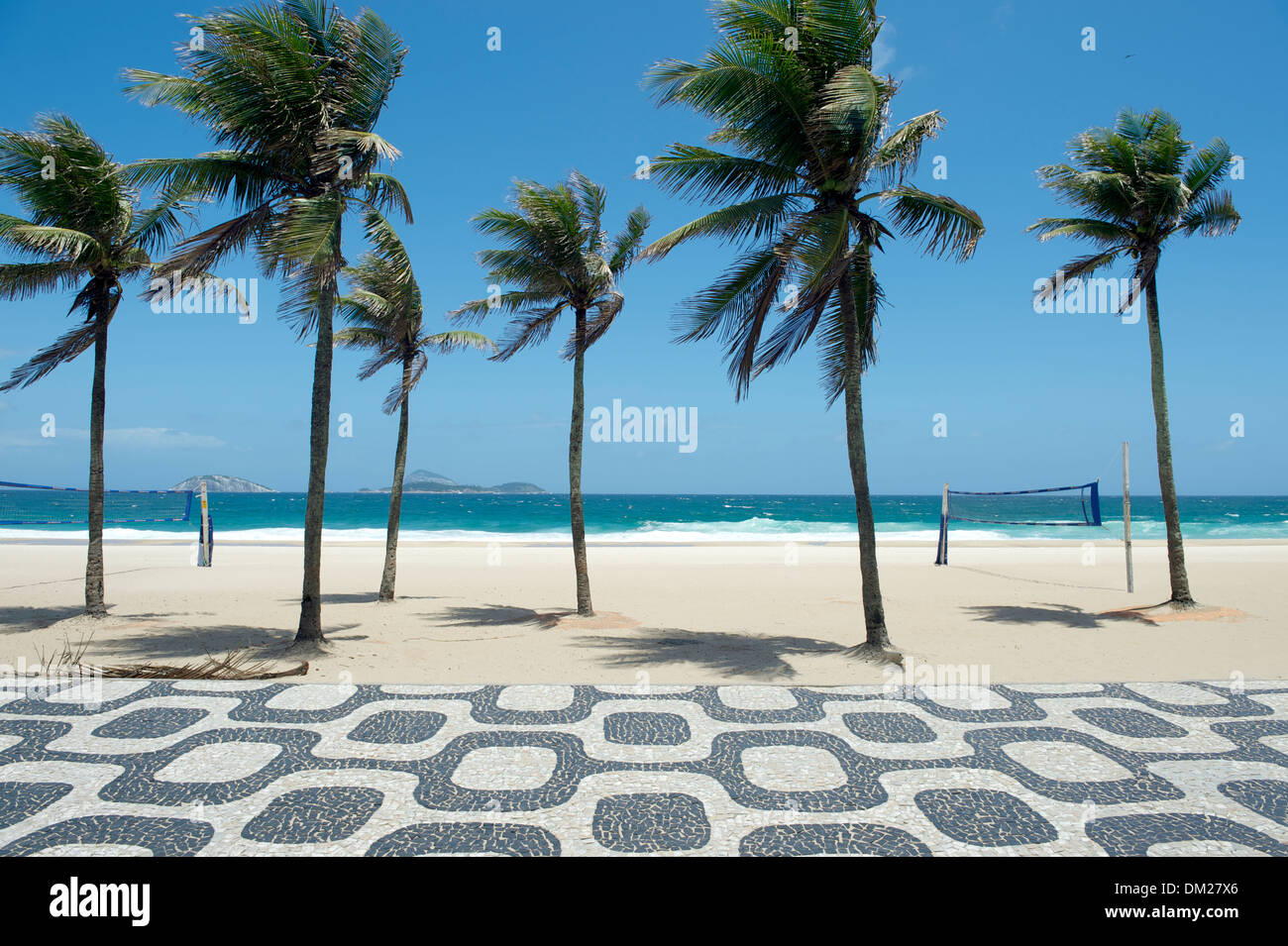 Classic empty view of Ipanema Beach Rio de Janeiro boardwalk with palm ...